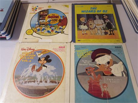 KansasOnlineAuctions.com - RCA CED Movies Smurfs, DISNEY Cartoon Parade ...